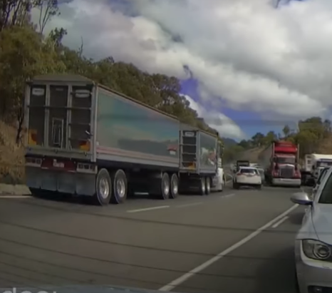 VIDEO: Truckie avoids Cunningham's Gap roadworks disaster | News