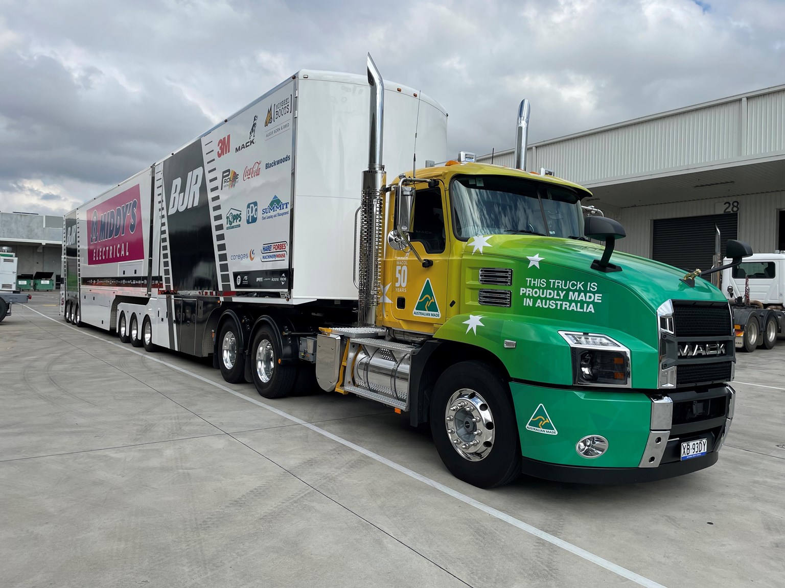 Custom Mack Anthems to transport supercars around the country